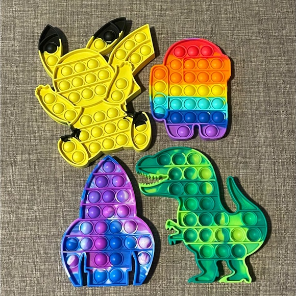 Toys | Pop It Bundle Pikachu Among Us Rocket Ship And Dinosaur Trex ...
